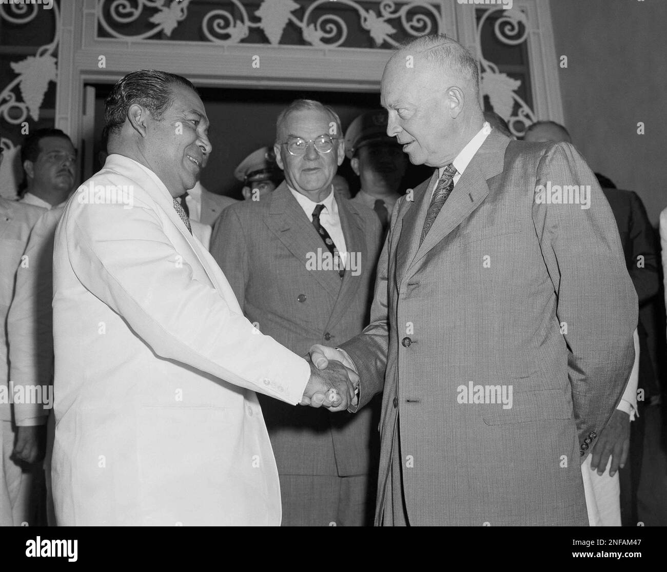 President Dwight D. Eisenhower shakes hands with President Fulgencio ...