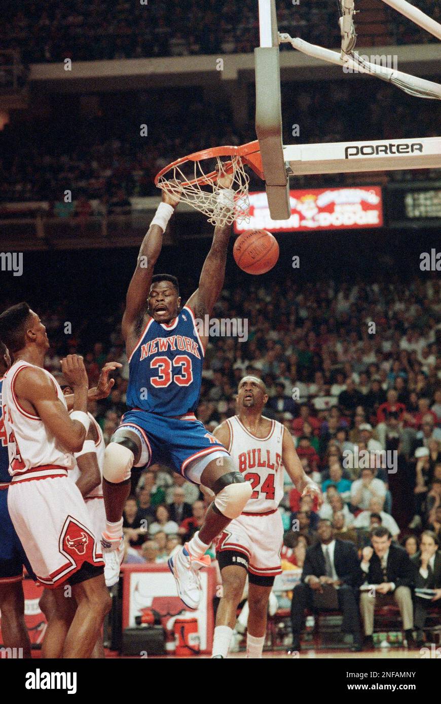 New York’s Patrick Ewing (33) slams one home for two points as Chicago ...
