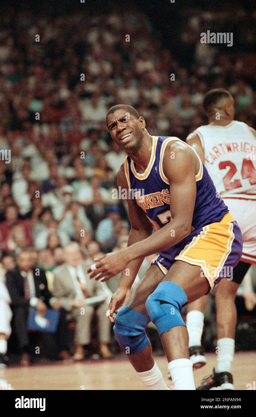 Los Angeles Lakers guard Earvin “Magic” Johnson reacts to a call during ...