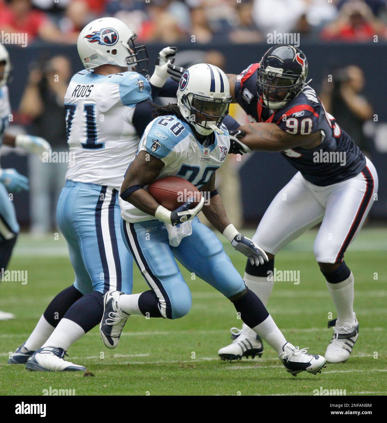 Tennessee Titans running back Chris Johnson (28) rushes for a gain ...