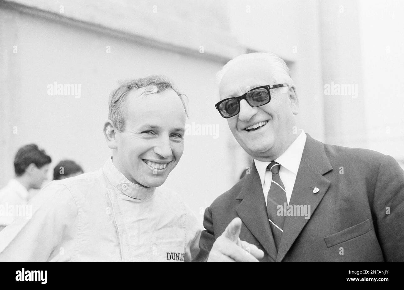 British ace driver John Surtees, left, and Italian race car ...