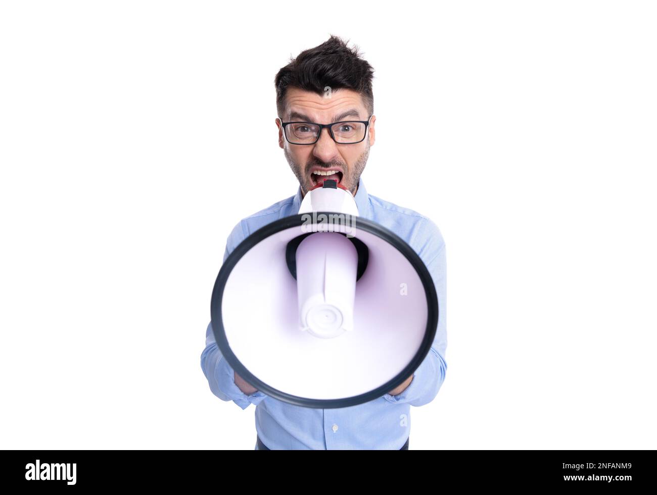 man shouting announcement with anger in megaphone. photo of man with ...