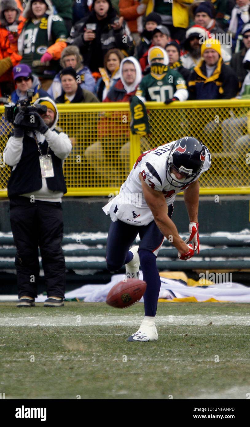 Houston Texans Kevin Walter #83 spikes the ball after a touchdown ...