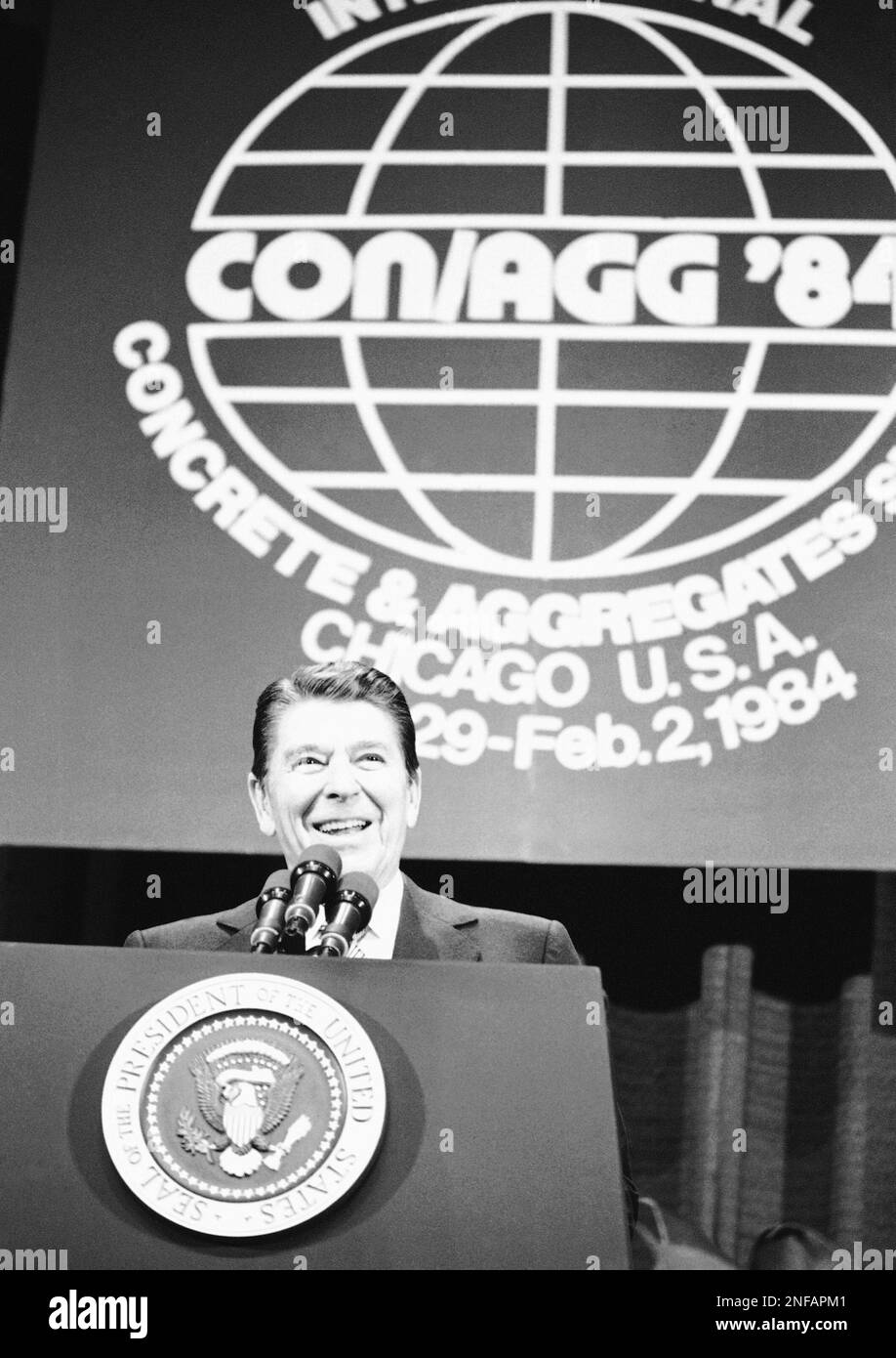 President Ronald Reagan laughs as he addresses a convention of building ...