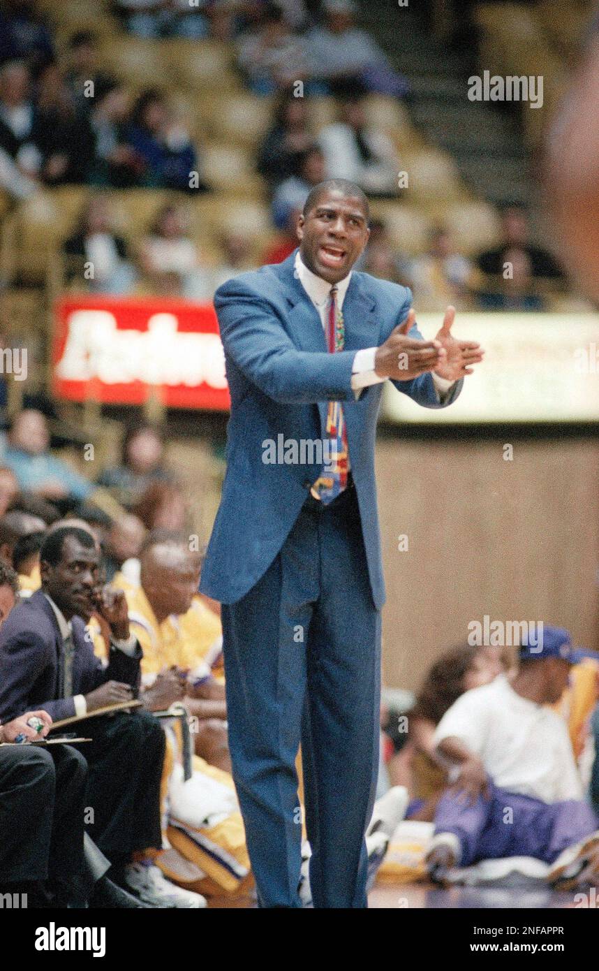 Los Angeles Lakers coach Magic Johnson offers some advice to his ...