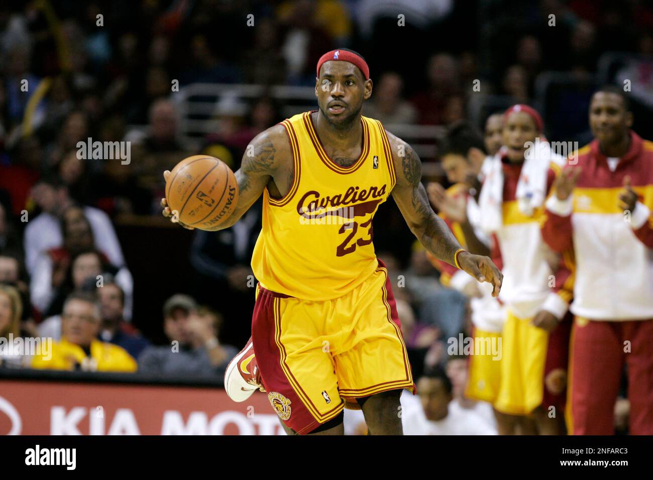 Cleveland Cavaliers' LeBron James brings the ball up court during an ...