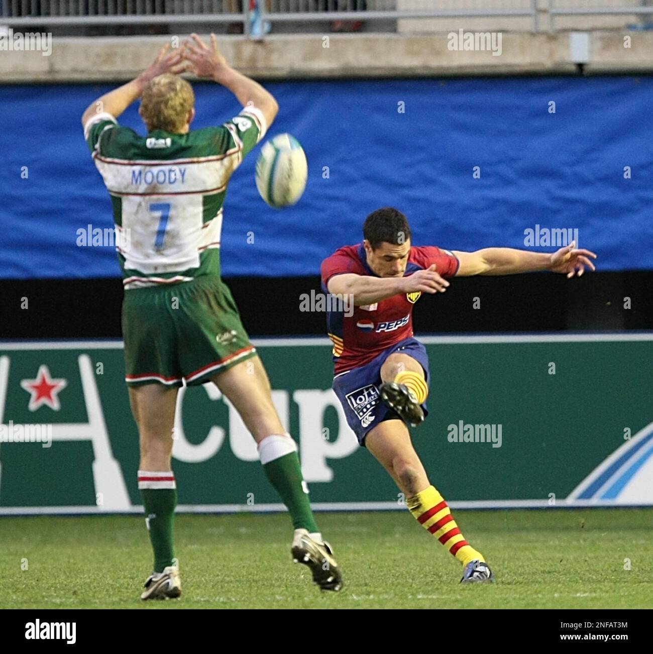 New Zealand flyhalf Dan Carter of Perpignan, kicks the ball in front of ...