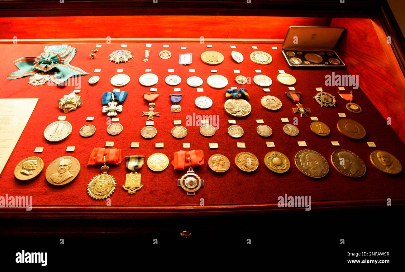 Medals belonging to Chile's late dictator Gen. Augusto Pinochet sit in ...