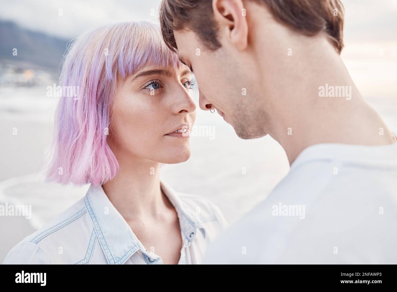 Intimacy, beach and couple with a love moment while on summer date for ...