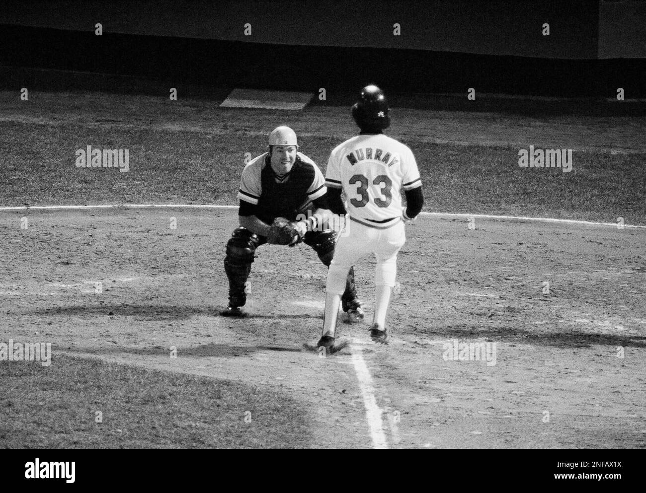 Pirates catcher Ed Ott waits at home play for Eddie Murray (33) who was ...