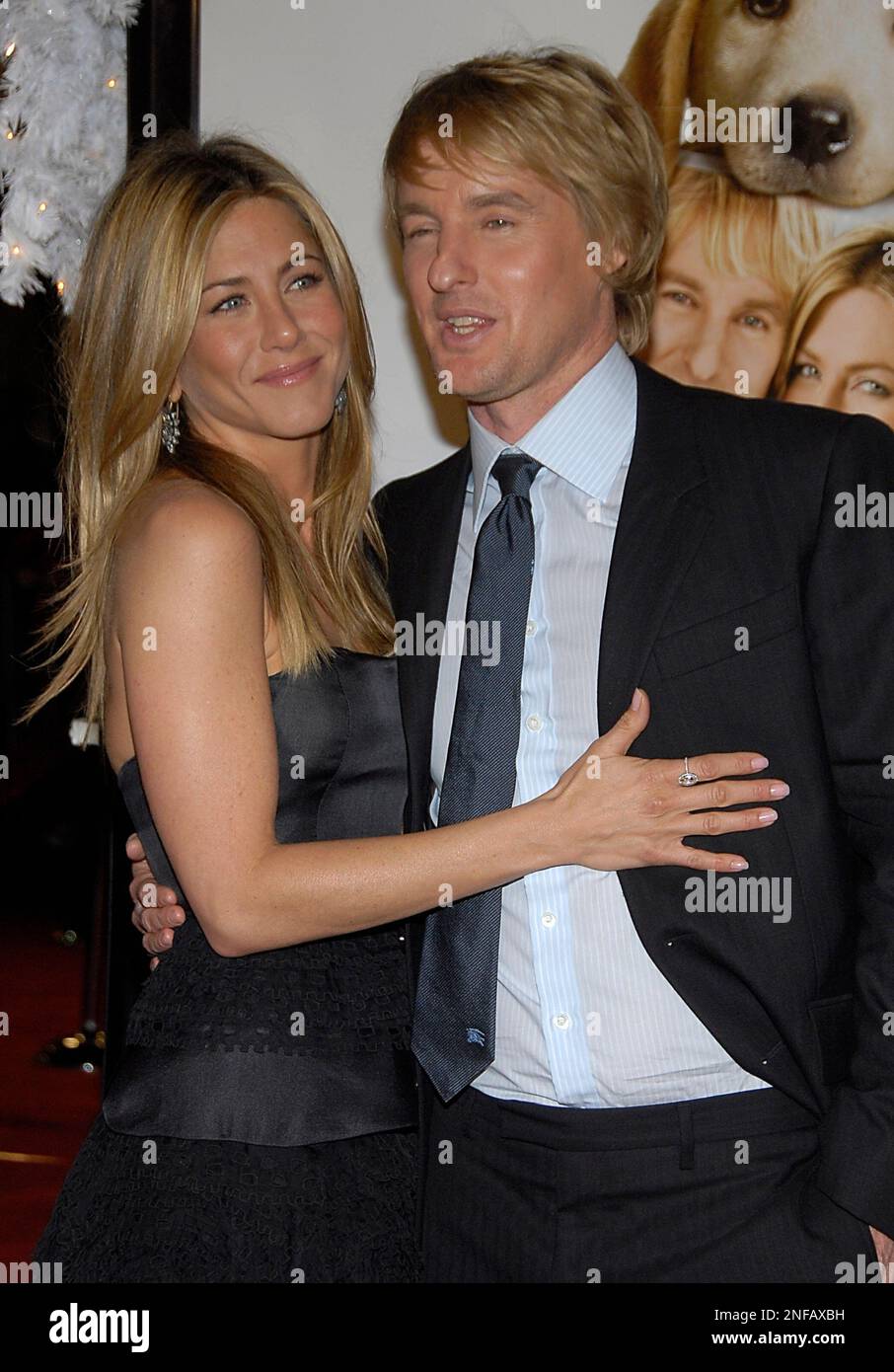 Actress Jennifer Aniston, left, and actor Owen Wilson pose on the press ...
