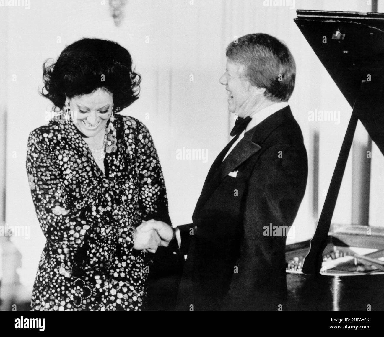 President Jimmy Carter, right, shakes hands with Mexican first lady ...