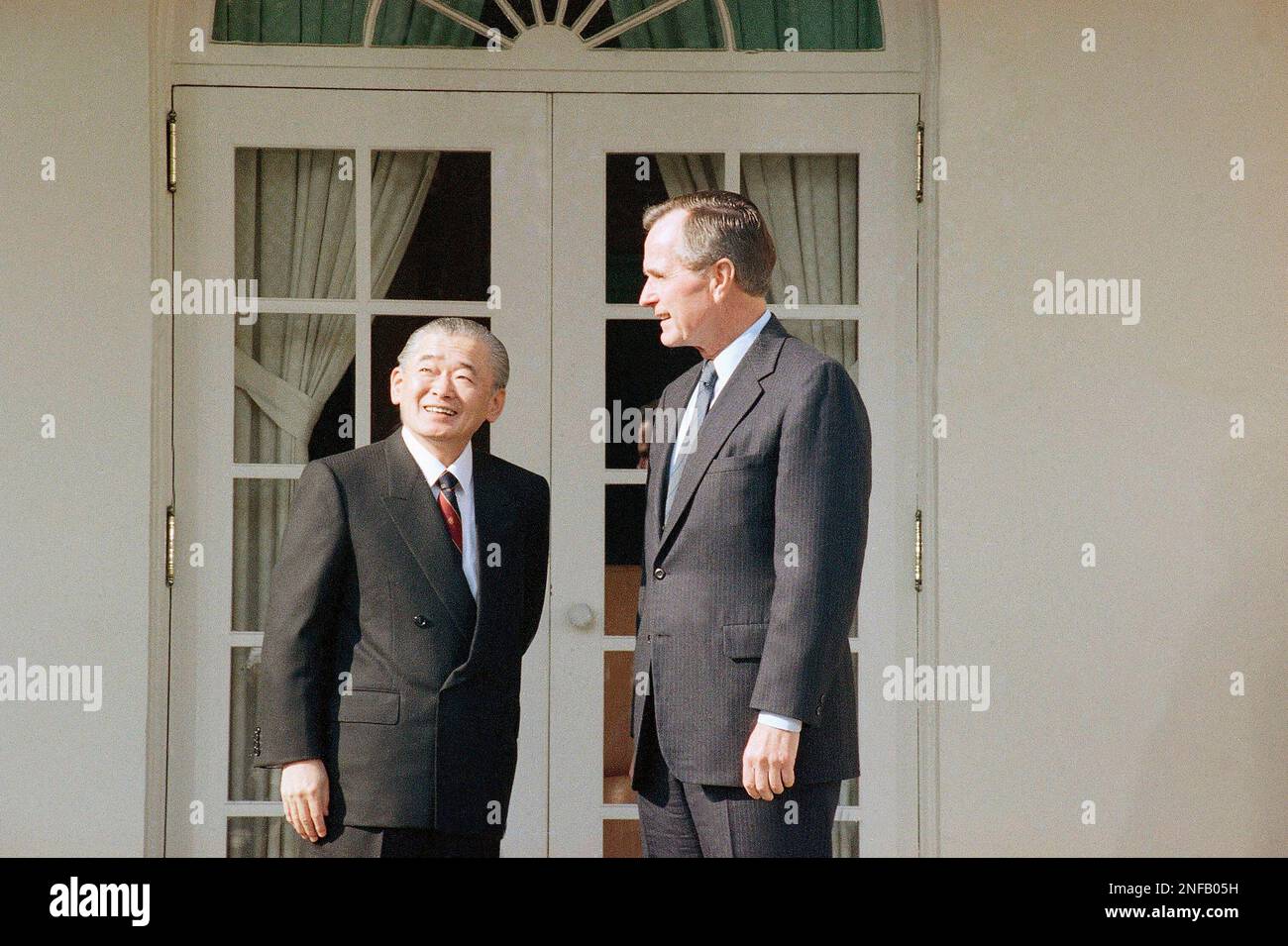Japanese Prime Minister Noboru Takeshita is greeted by President George ...