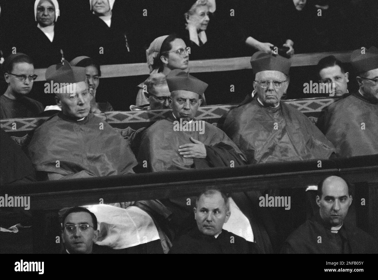 Seated, left to right, in St. Peter's Basilica during a requiem Mass ...