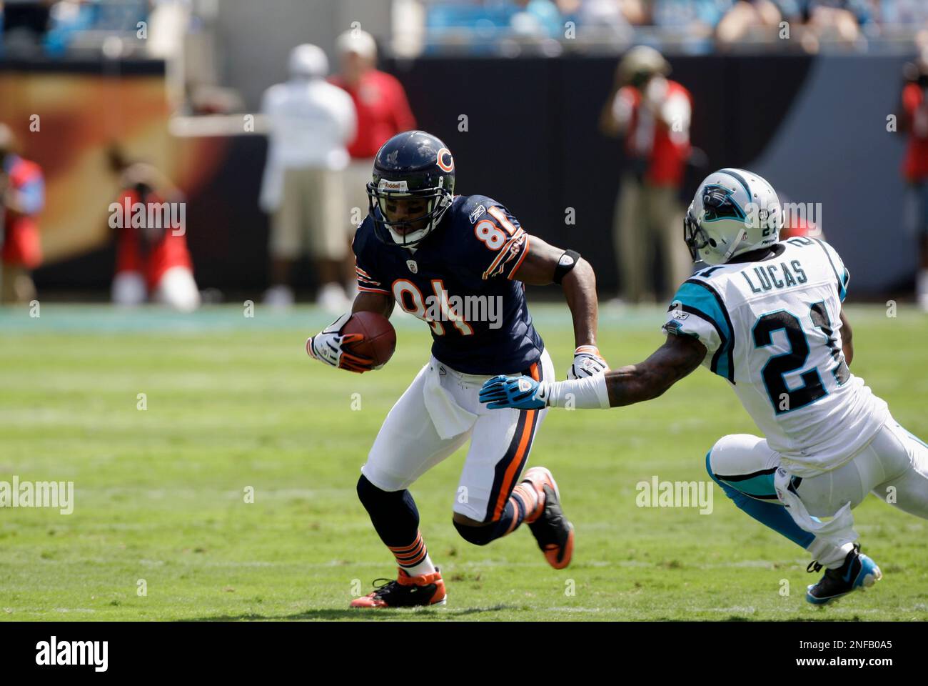 Chicago Bears wide receiver Rashied Davis (81) runs with the ball as ...