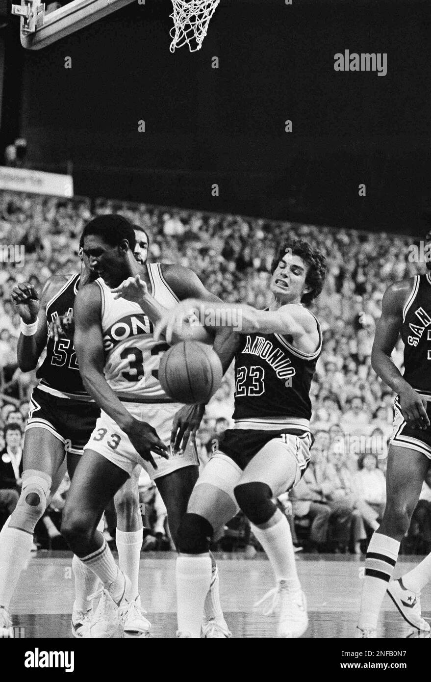 Seattle Supersonic Ray Tolbert (33) gets all tangled up with San ...