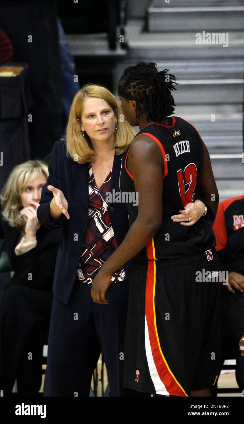 Maryland coach Brenda Frese, left, talks with center Lynetta Kizer (12 ...