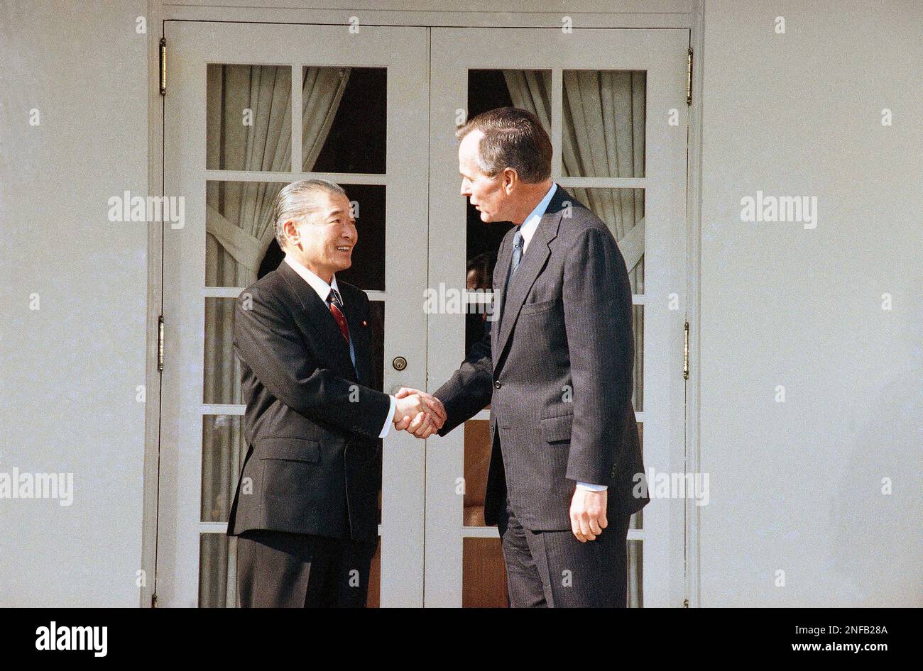 Japanese Prime Minister Noboru Takeshita and President George Bush ...