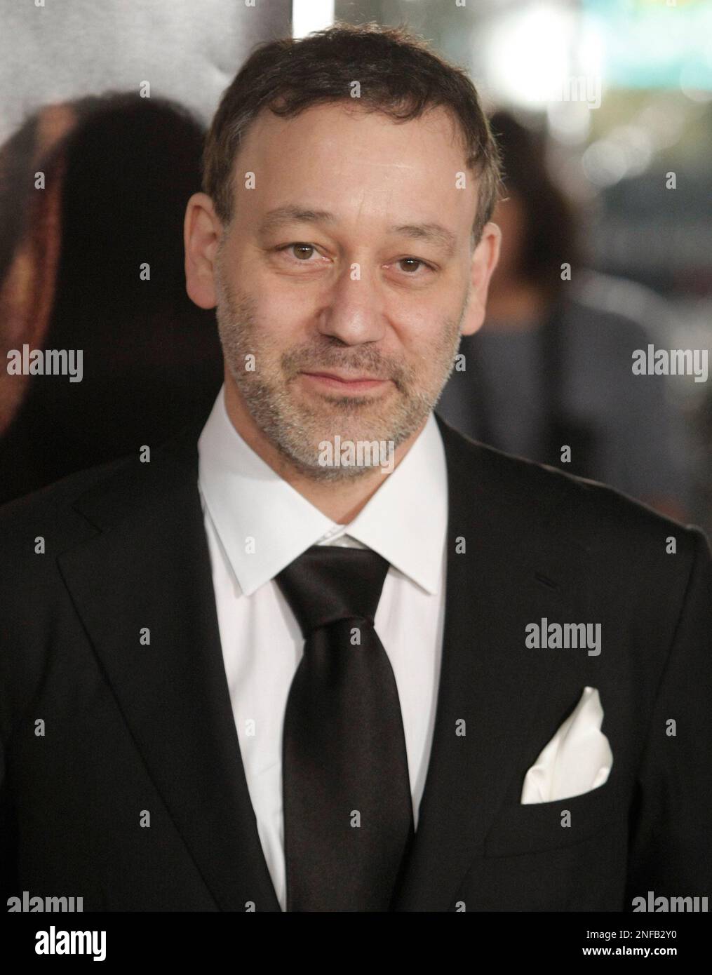 Director Sam Raimi poses on the press line at the premiere of the ...