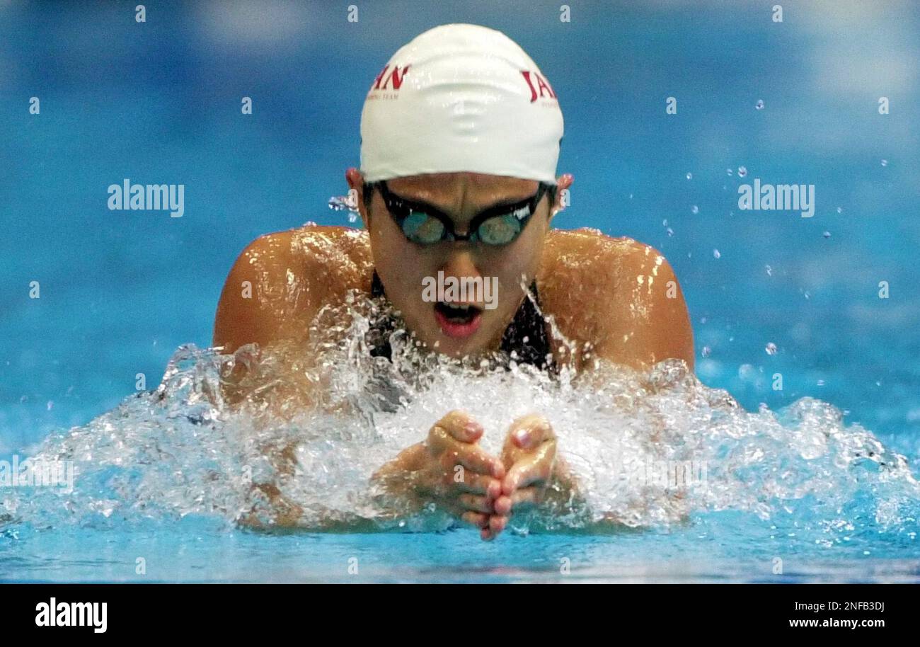Japanese swimmer Masami Tanaka competes in a heat of the women's 4 x ...