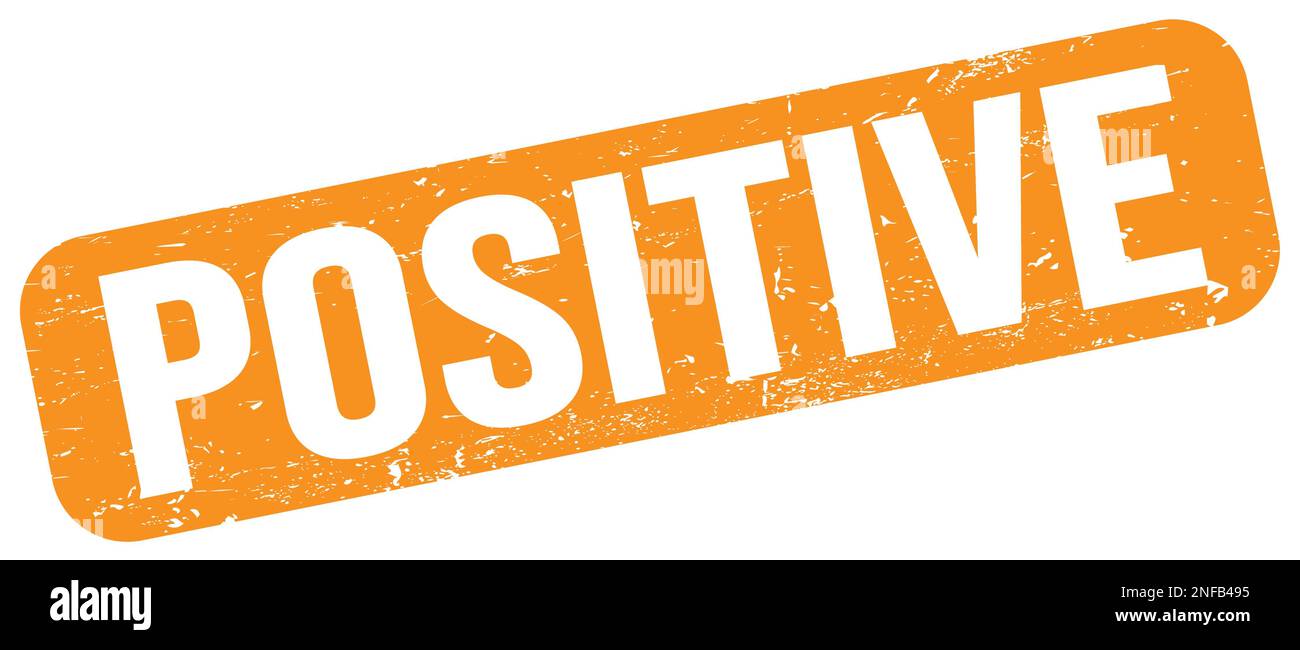 POSITIVE text written on orange grungy stamp sign Stock Photo - Alamy
