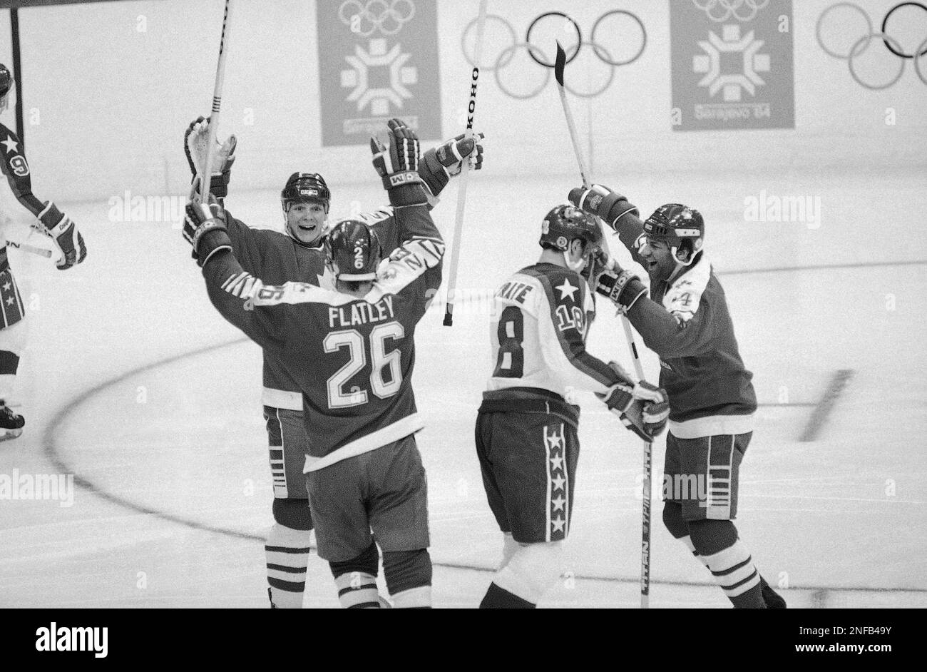 Canada's Carey Wilson (left rear), and teammates Pat Flatley (26) and ...