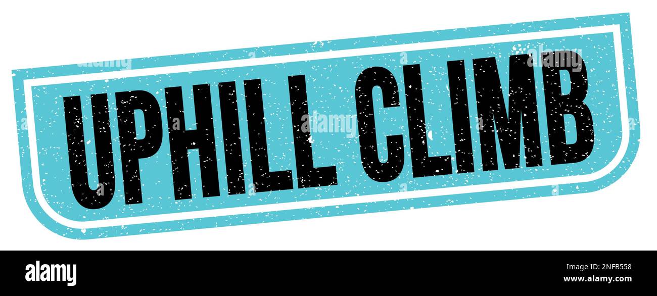 UPHILL CLIMB text written on blue-black grungy stamp sign Stock Photo ...