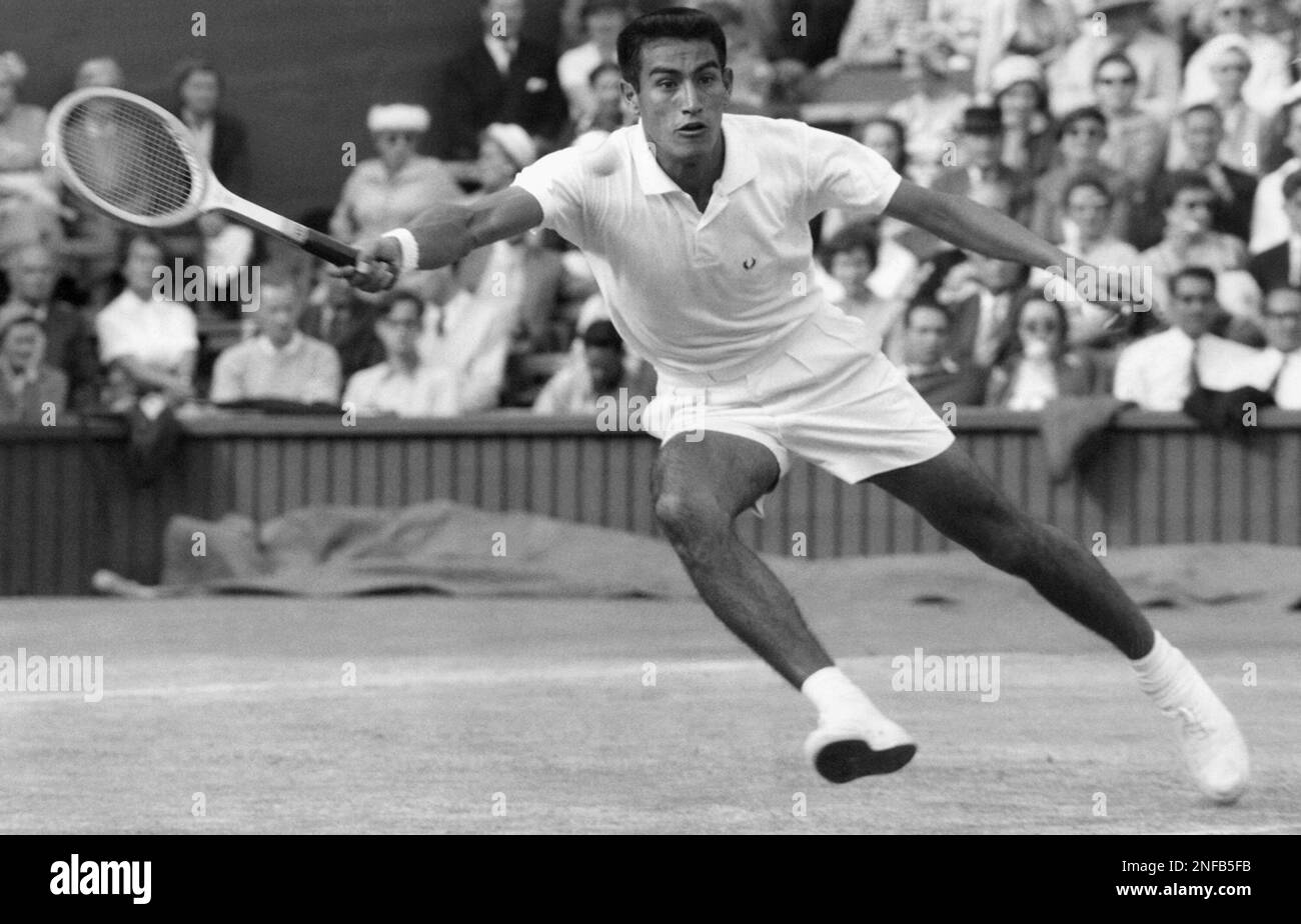 Peruvian-American Alex Olmedo in play against Roy Emerson of Australia ...