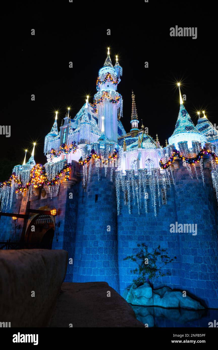 A vertical shot of the sleeping beauty castle in Disneyland Park Stock ...