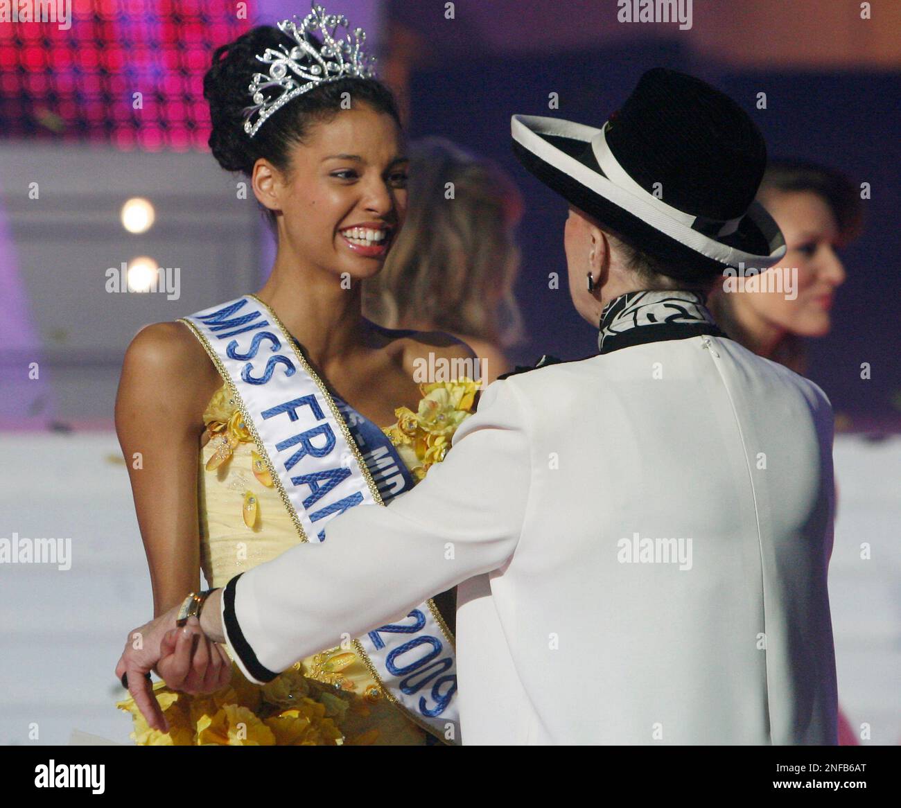 Clhoe Mortaud, 18, of Midi Pyrenees is congratulated by Miss France ...