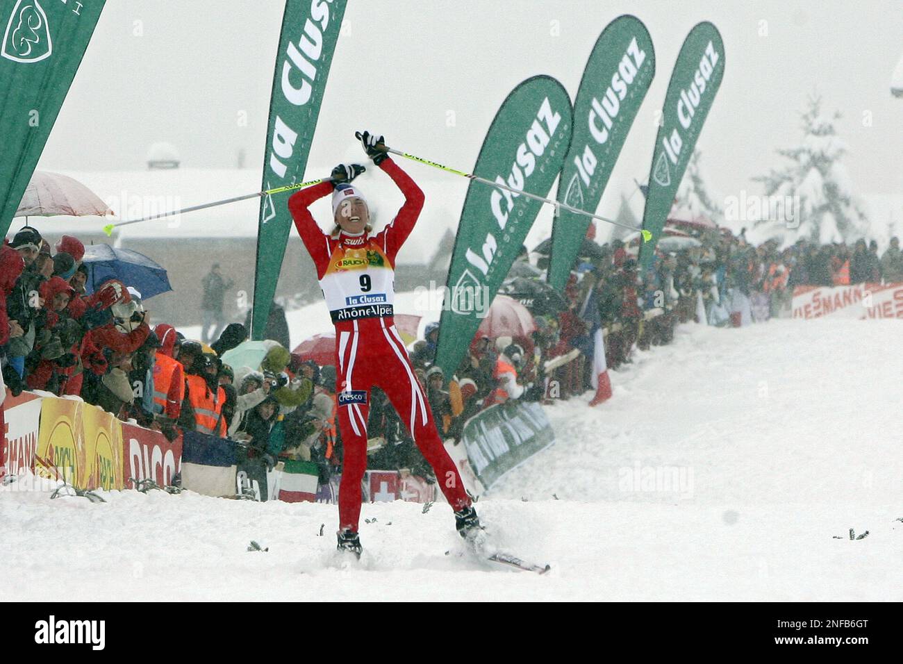 Kristin Stoermer Steira of Norway celebrates as she crosses the finish ...