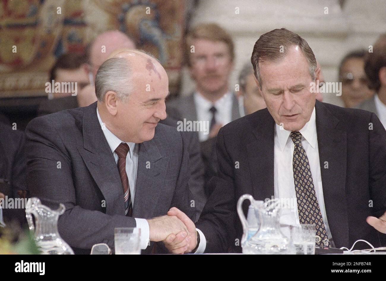 U.S. President George Bush and Soviet President Mikhail Gorbachev shake ...
