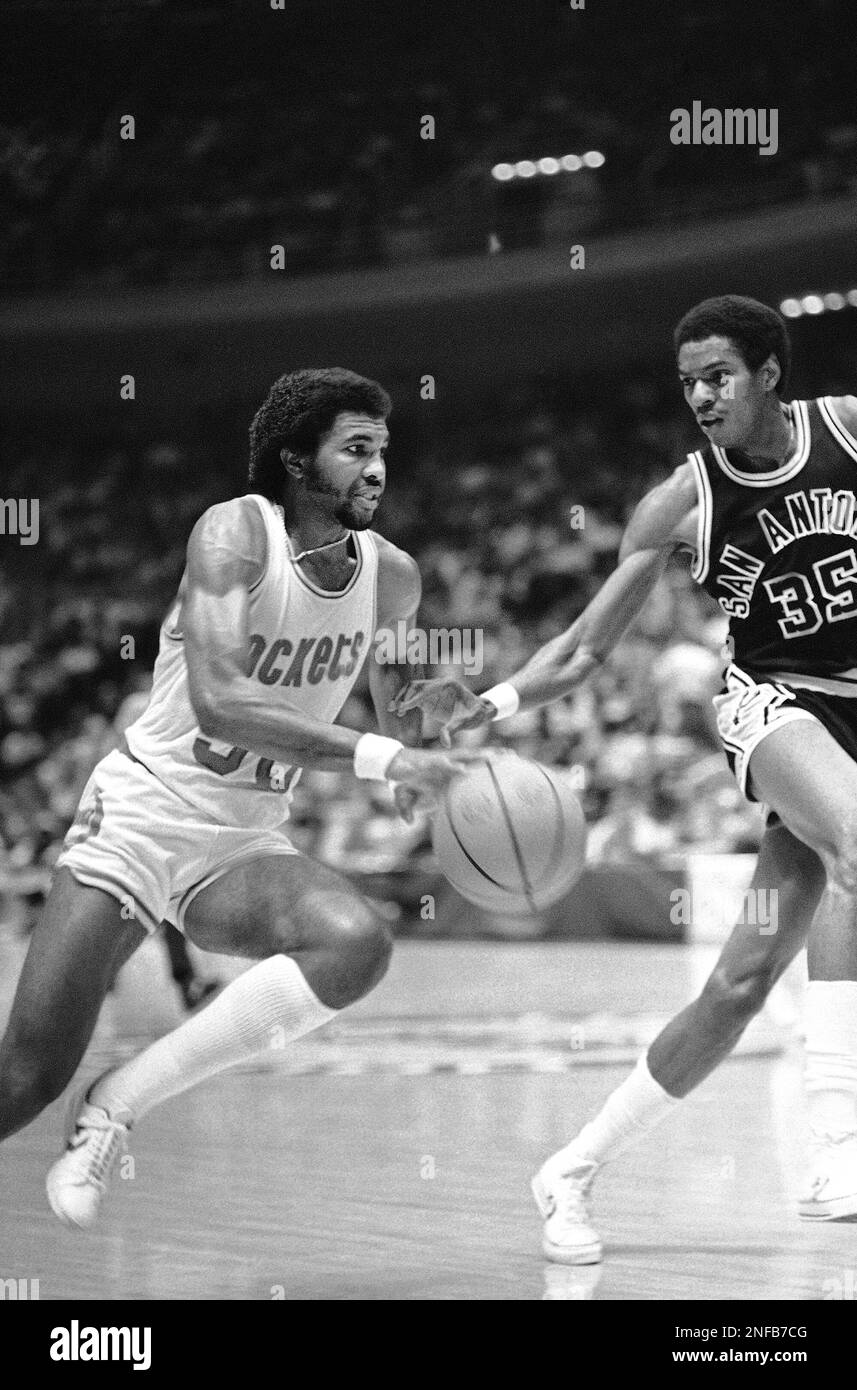 San Antonio Spurs Larry Kenon (35) reaches in to pick the ball away ...