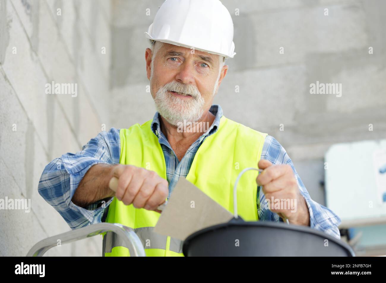 Bearded plasterer hi-res stock photography and images - Alamy
