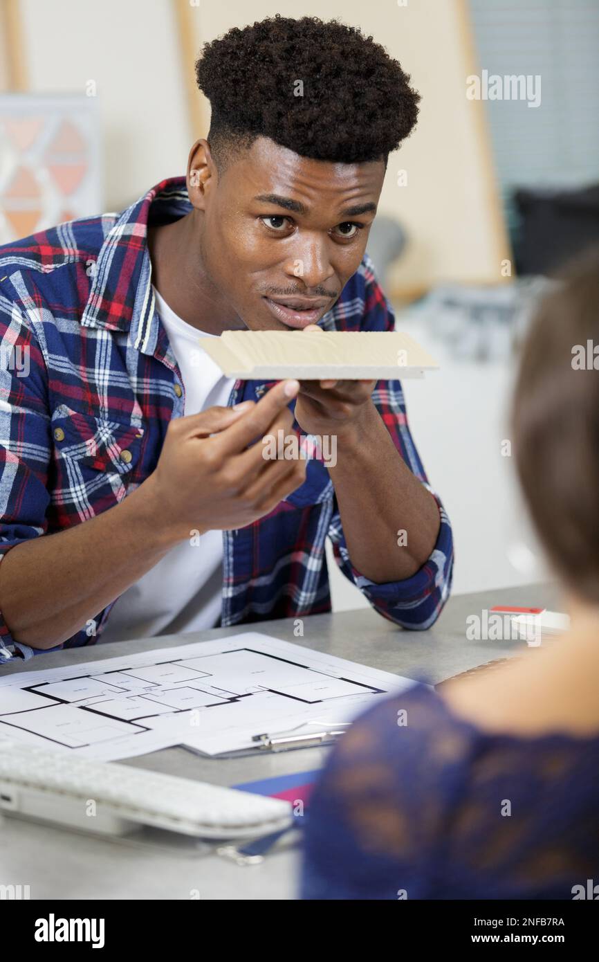 man architect talking to customer Stock Photo - Alamy