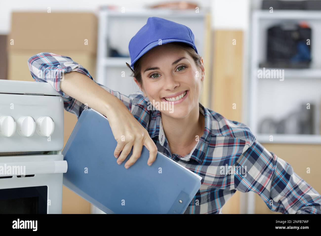 portrait of a female quality inspector smiling Stock Photo - Alamy
