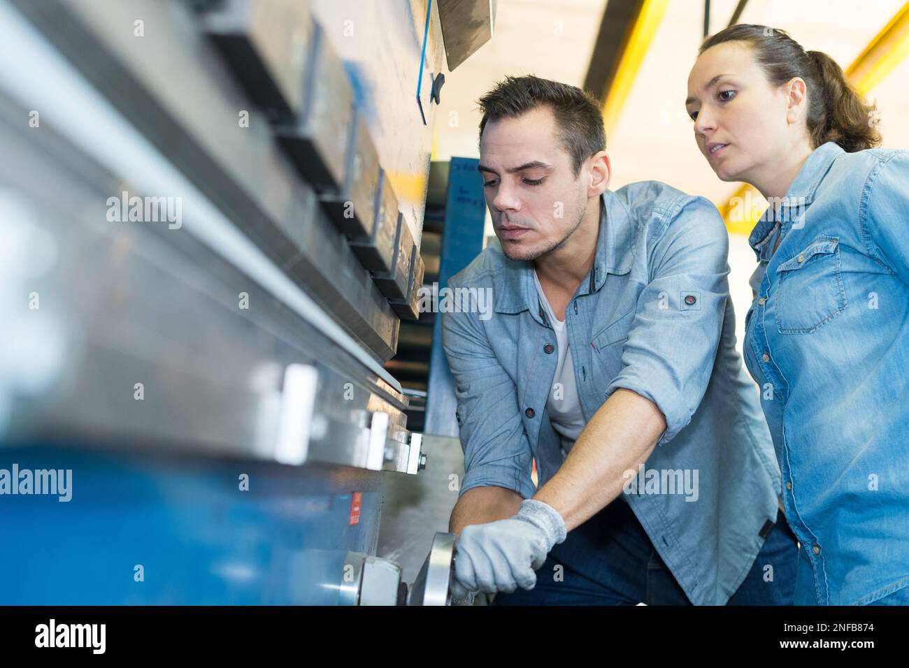 engineers in mechanical factory Stock Photo - Alamy