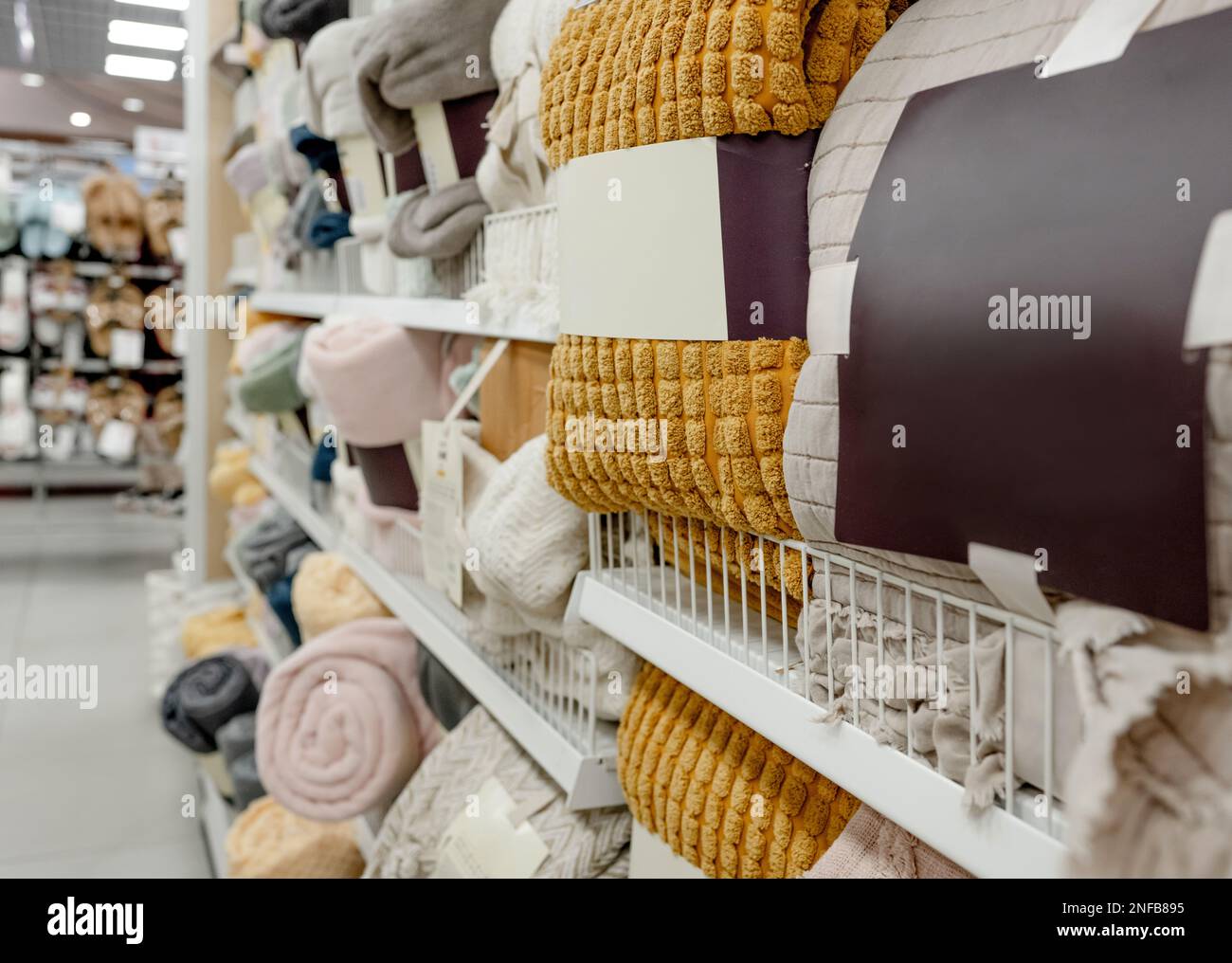 Blankets variety in commercial shopping center Stock Photo - Alamy