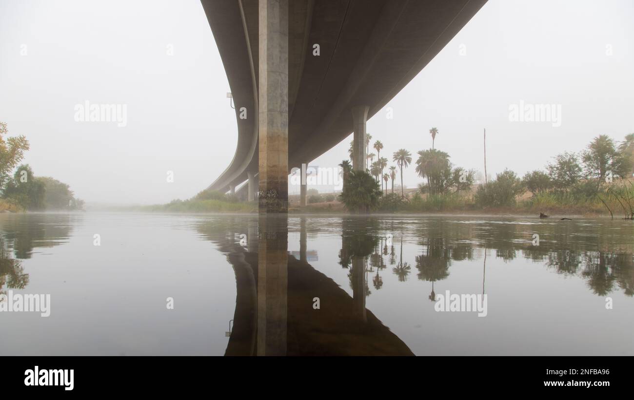 Colorado River bridge at Yuma Az in fog Stock Photo - Alamy