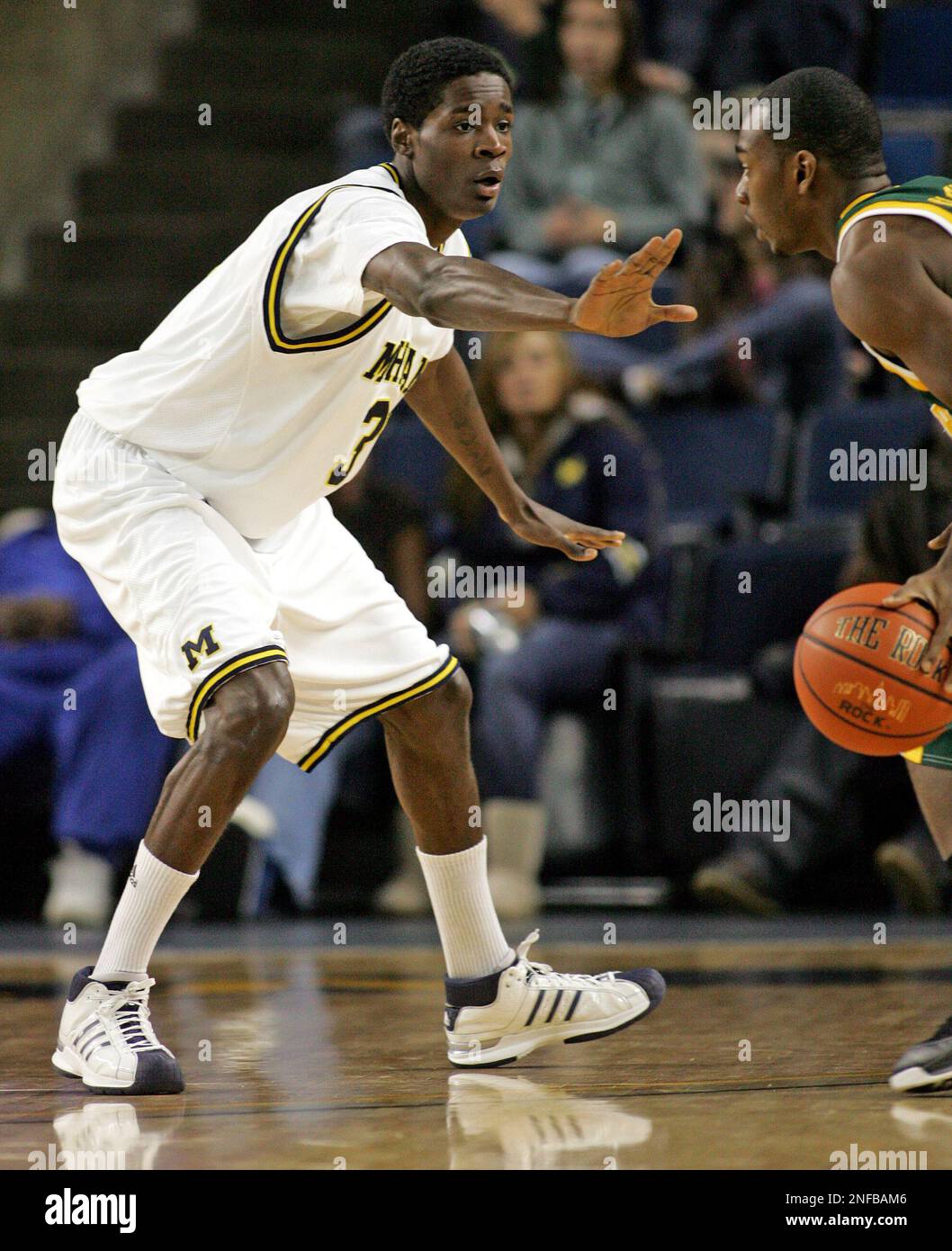 Michigan guard Manny Harris (3) defends Norfolk State guard Michael ...