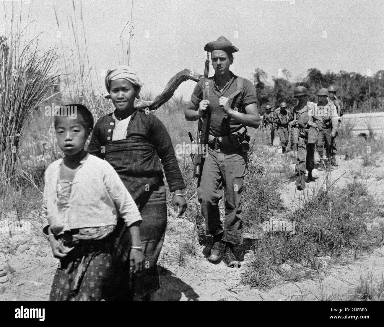 Kachin Natives, whose villages and crops have be burned by withdrawing Japanese troops were so ...