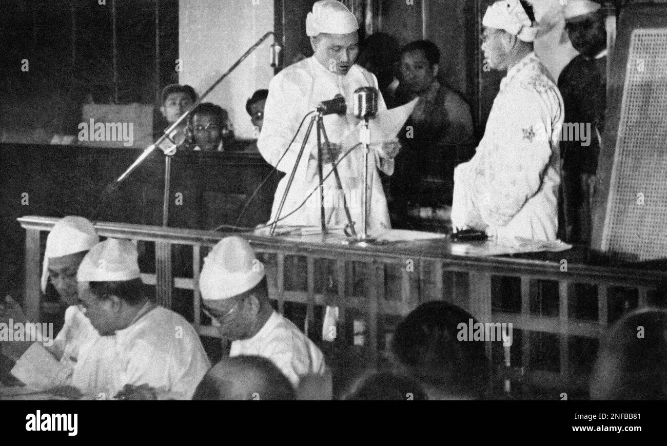 Prime Minister Thakin Nu, (left), takes oath of office from Burmese ...