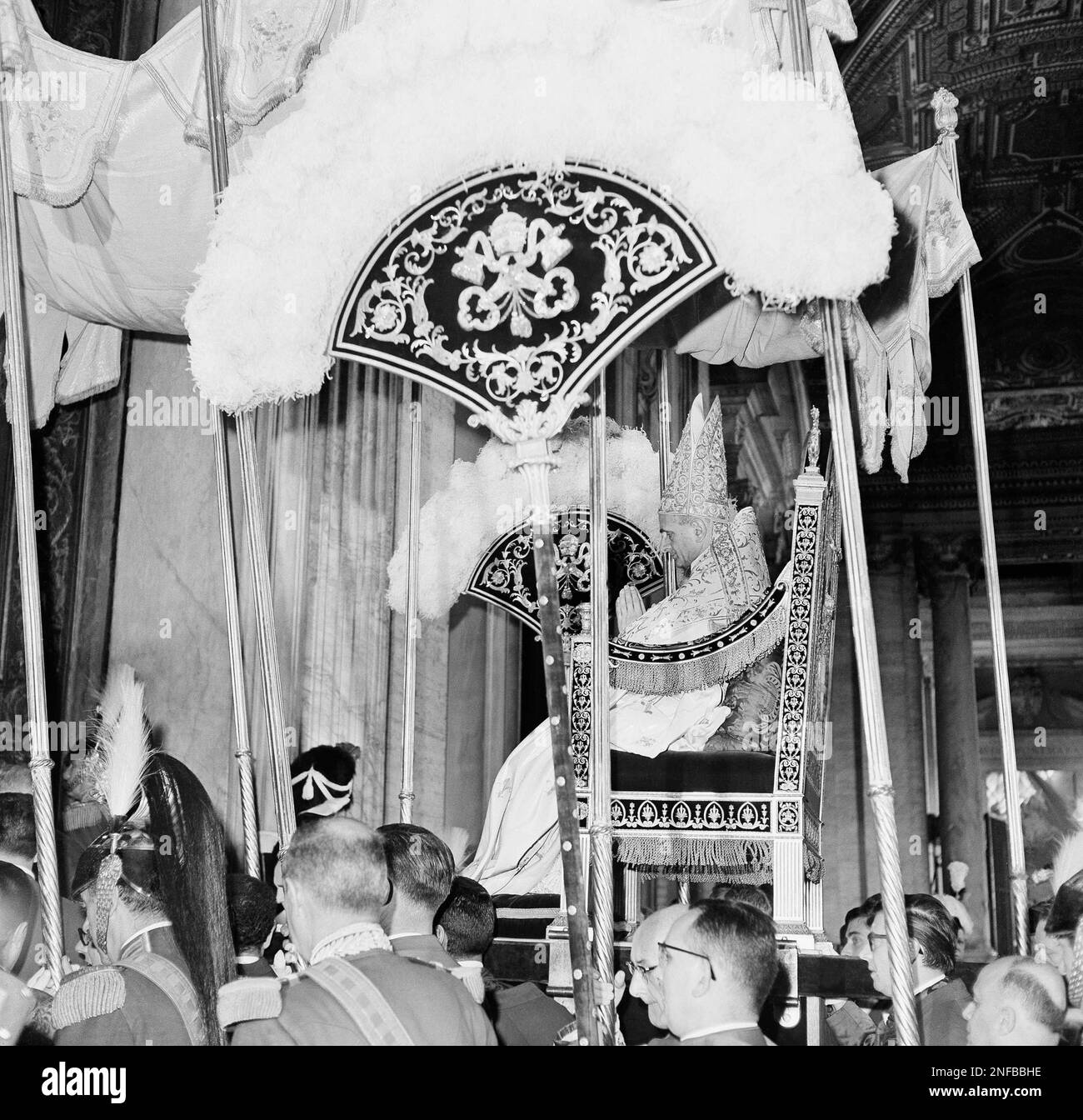 Pope Paul VI sits on portable throne as he is carried through St. Peter ...