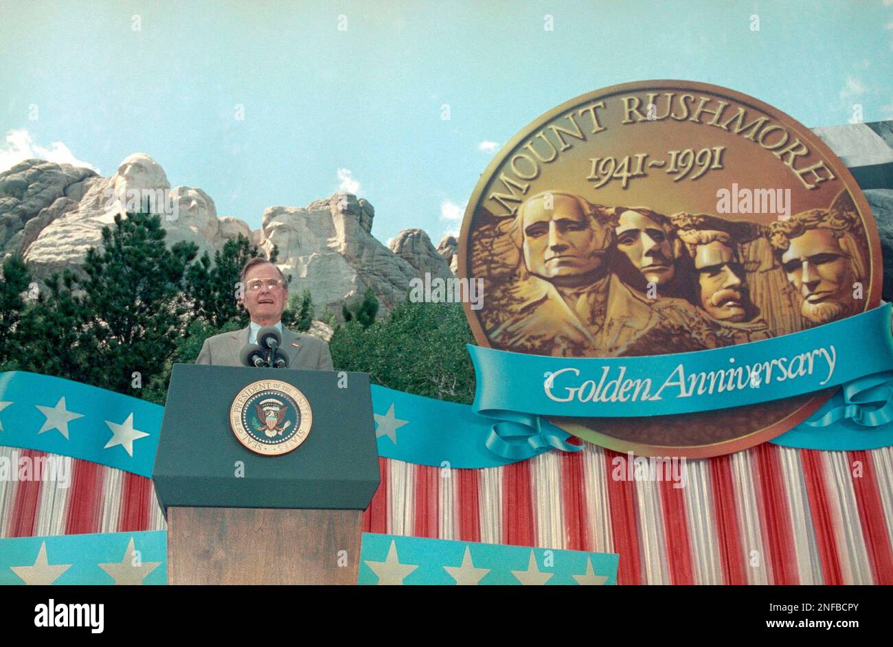 A giant replica of a coin commemorating the 50th anniversary of Mount ...