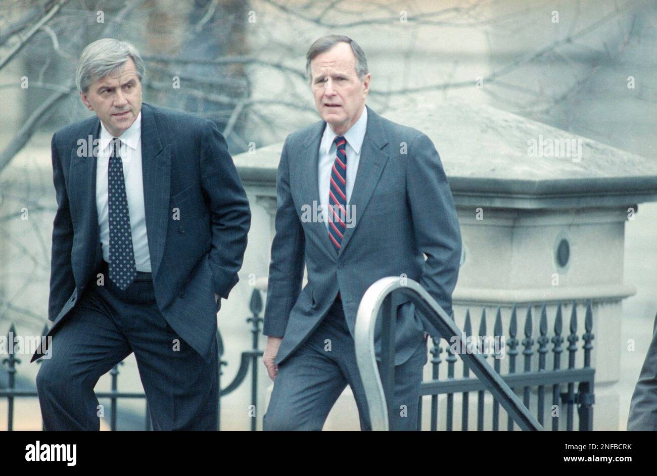 President George Bush, with media adviser Sig Rogich, returns to the ...