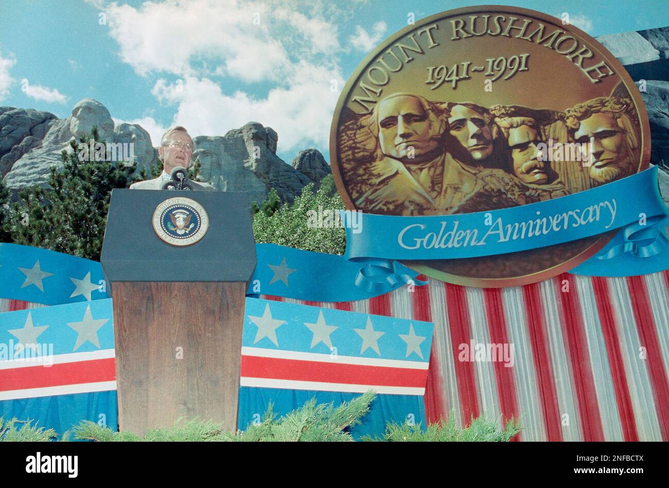 A giant replica of a coin commemorating the 50th anniversary of Mount ...