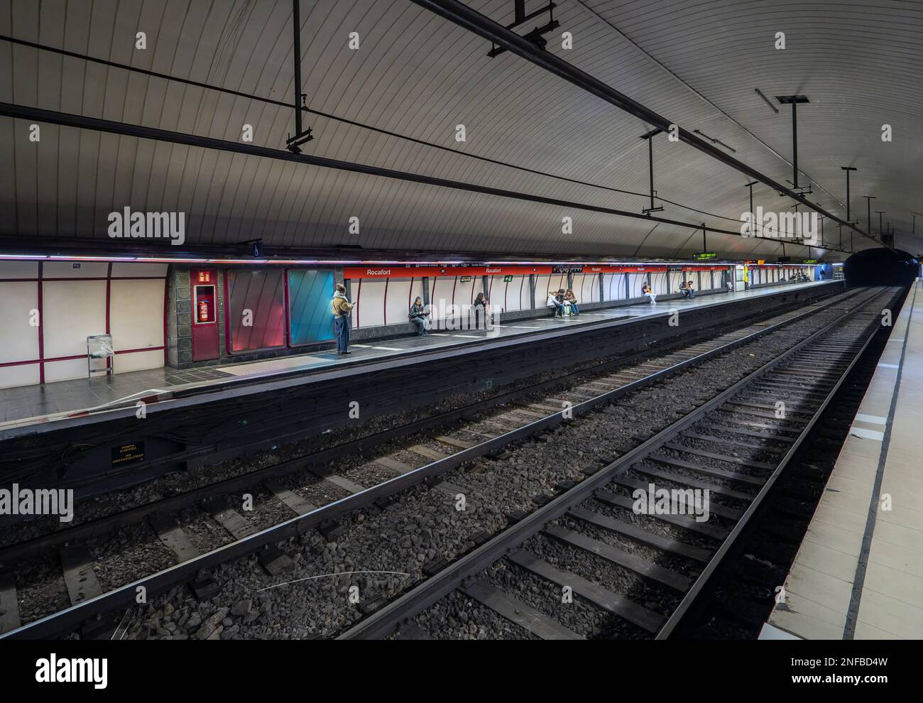 Train tracks and rails of the Barcelona metro or subway station and ...