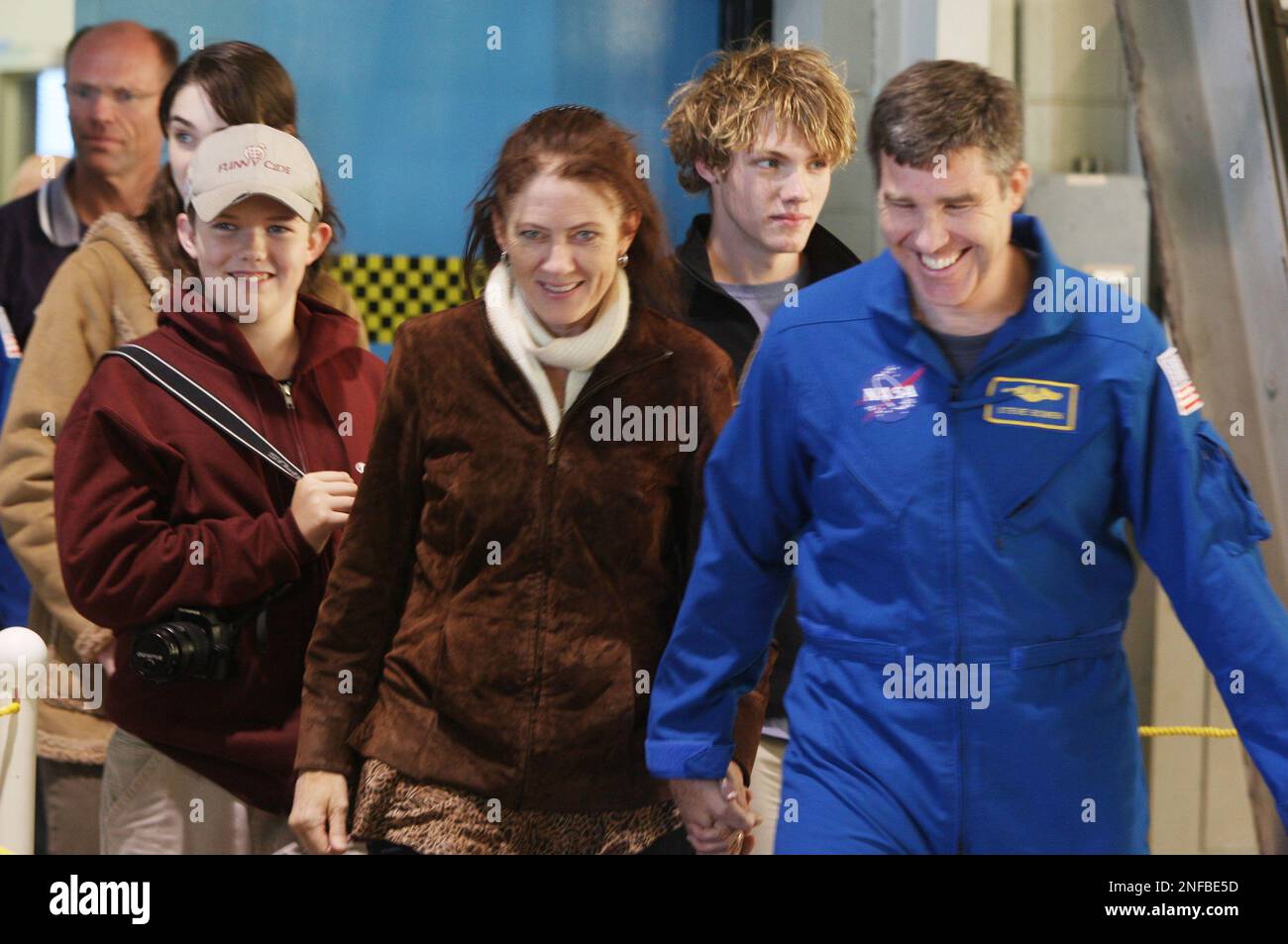 Astronaut Steve Bowen, along with his wife Debbie and his children Max ...