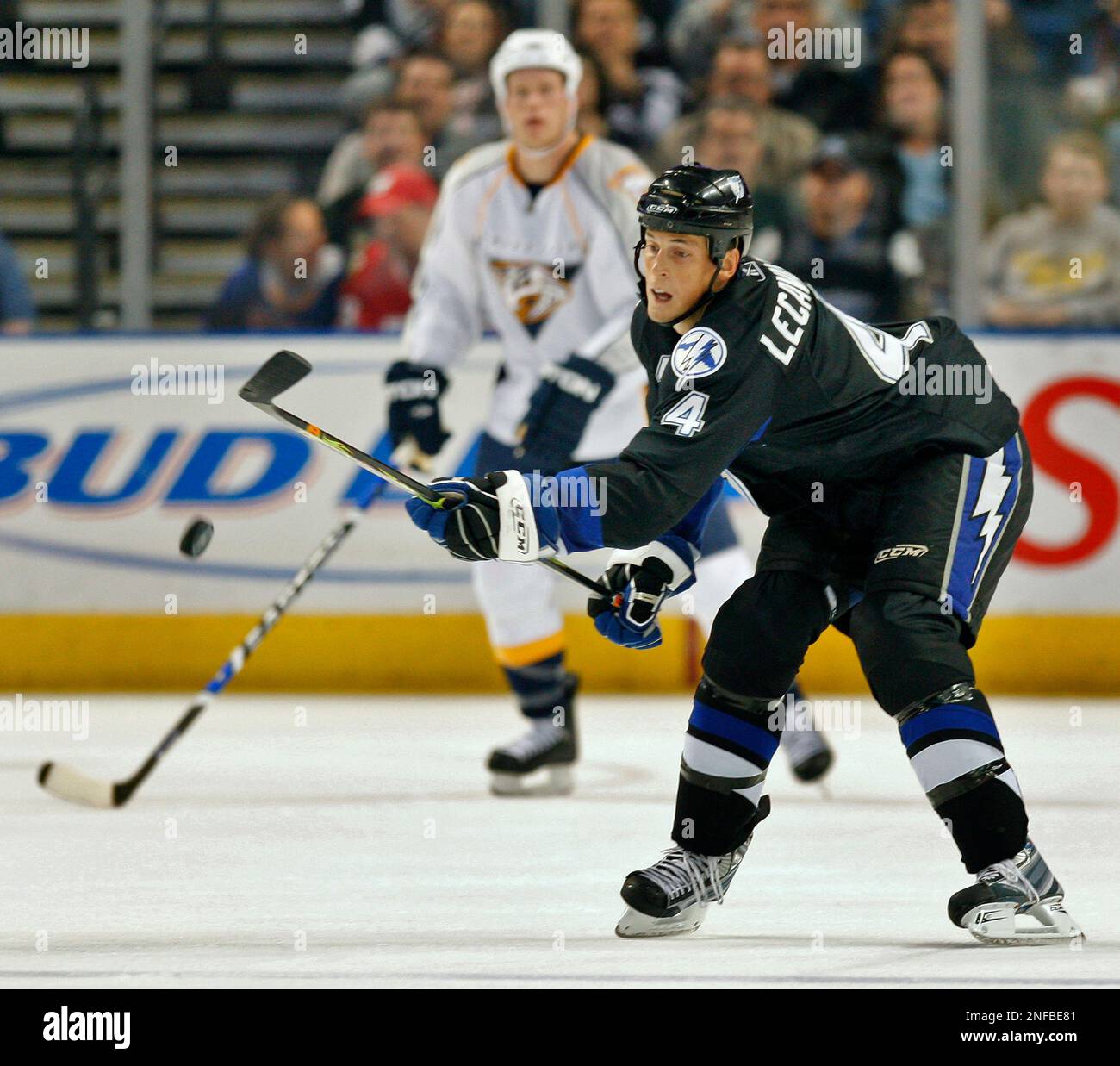 Tampa Bay Lightning center Vincent Lecavalier (4) reaches for a loose puck against the Nashville ...