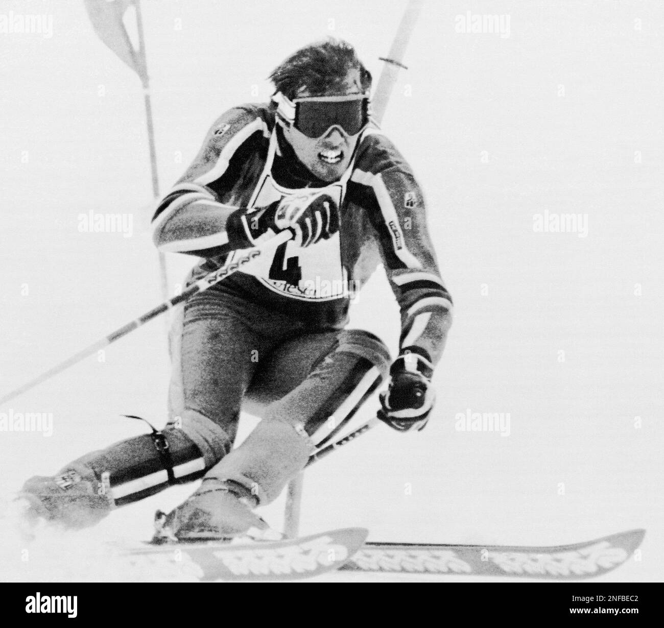 Phil Mahre of White Pass, Wash., dives through a gate in heavy mist on ...